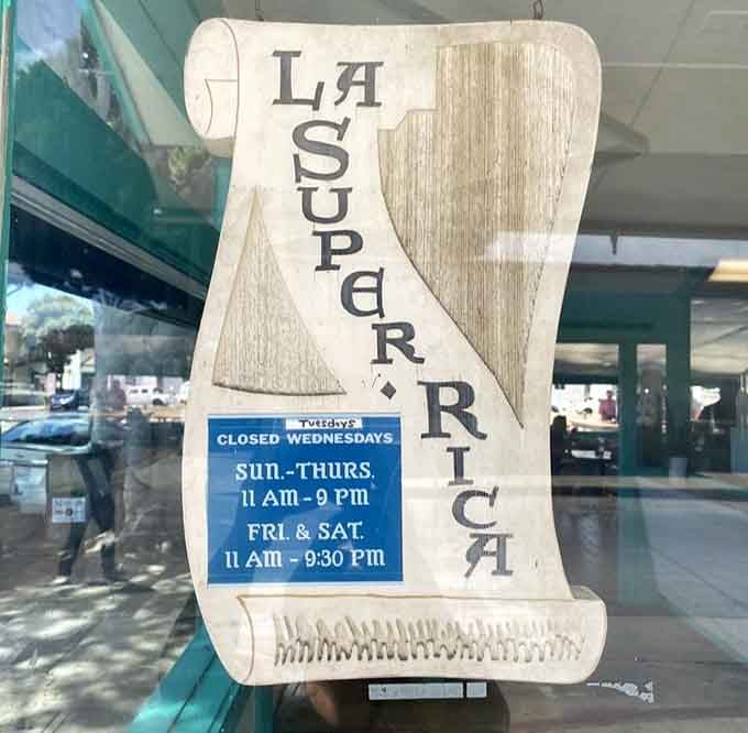 Operating hours posted clearly, because knowing when to get your fix is half the battle won.