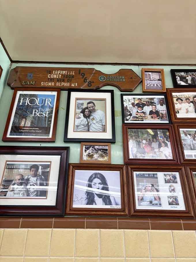 Framed photos and memorabilia cover the walls like a scrapbook of Detroit history, celebrities, and countless satisfied customers.