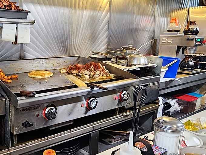 That griddle has seen more action than most people's entire kitchens, turning out perfection one order at a time.