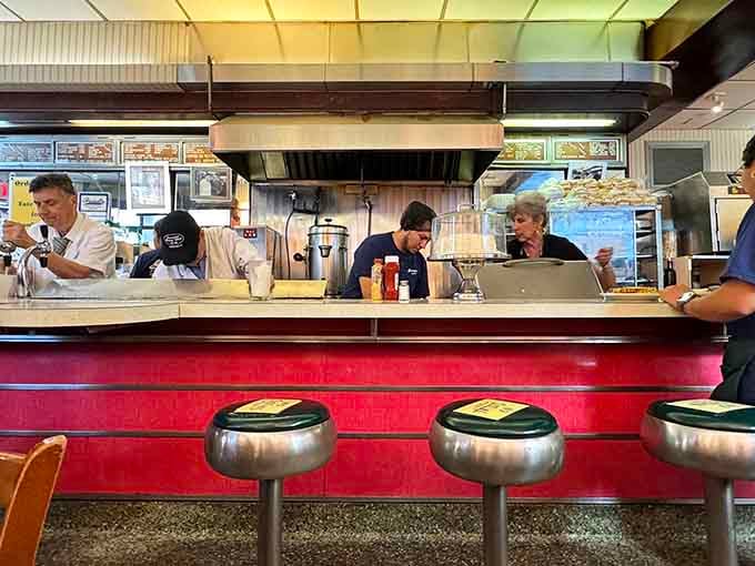 Counter dining at its finest, where strangers become friends and the staff remembers your order after just two visits.