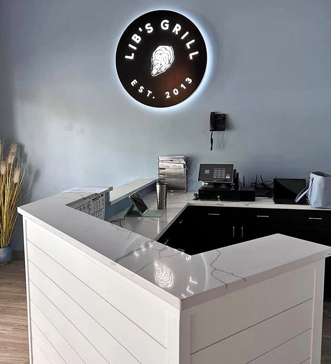 Clean, modern ordering counter where your delicious journey begins with a friendly smile and helpful staff.