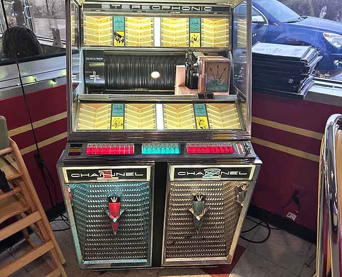 The vintage jukebox stands ready to provide the perfect soundtrack to your meal.