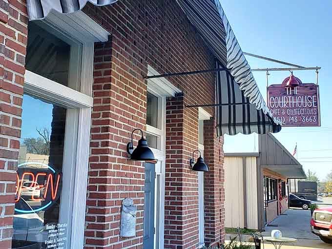 The Courthouse Cafe beckons from its brick storefront, promising home cooking within walking distance of literary history.