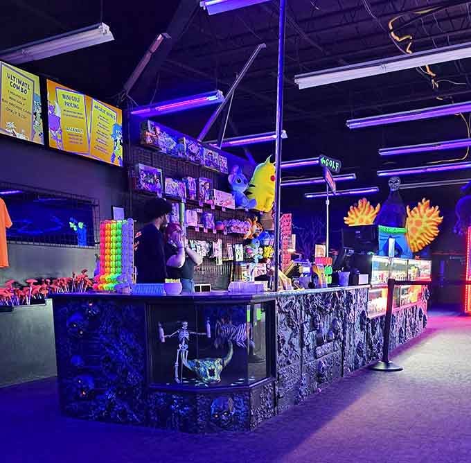 The snack counter glows with its own personality, offering refreshments for those who've worked up an appetite chasing balls.