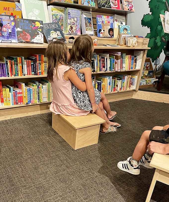 Two young readers sharing a quiet moment, building memories and vocabulary one page at a time.