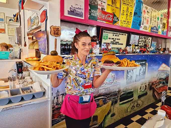 Staff in retro attire balance massive burger plates like pros, making it look easier than it actually is.