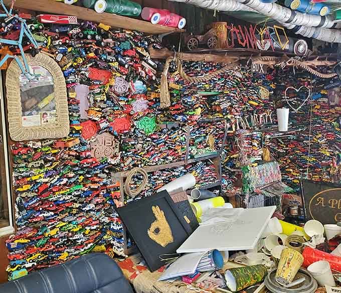 The gift shop overflows with miniature memories, a colorful contrast to the rusting giants outside.