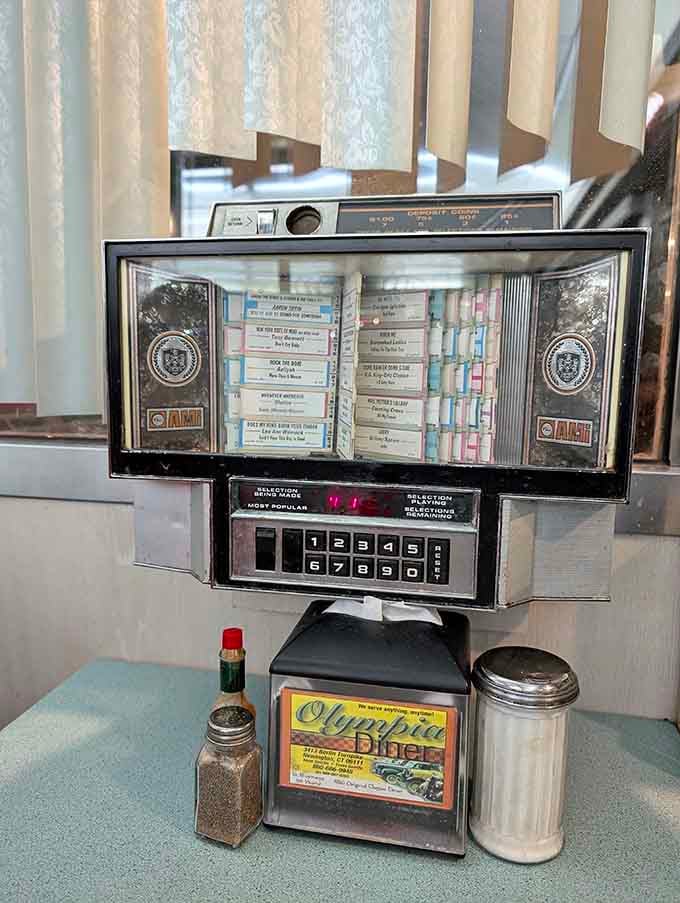 A tabletop jukebox ready to soundtrack your meal, because eating without music is like dancing without rhythm, technically possible but why.