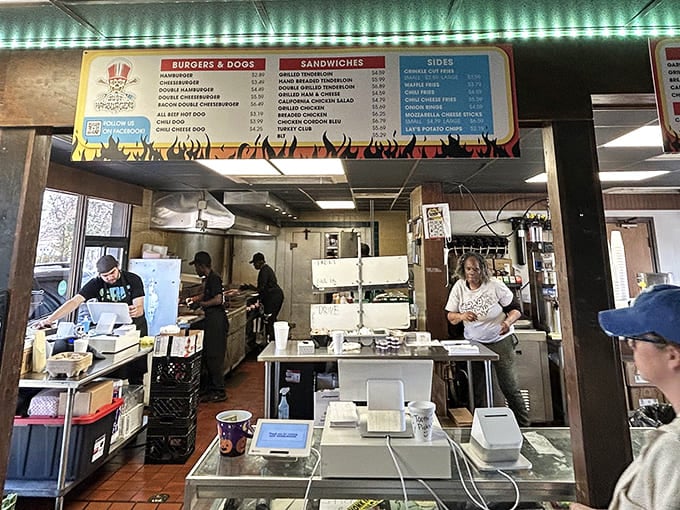 The open kitchen has nothing to hide &ndash; decades of burger-making expertise on full display as staff work with the confidence that comes from doing one thing exceptionally well.