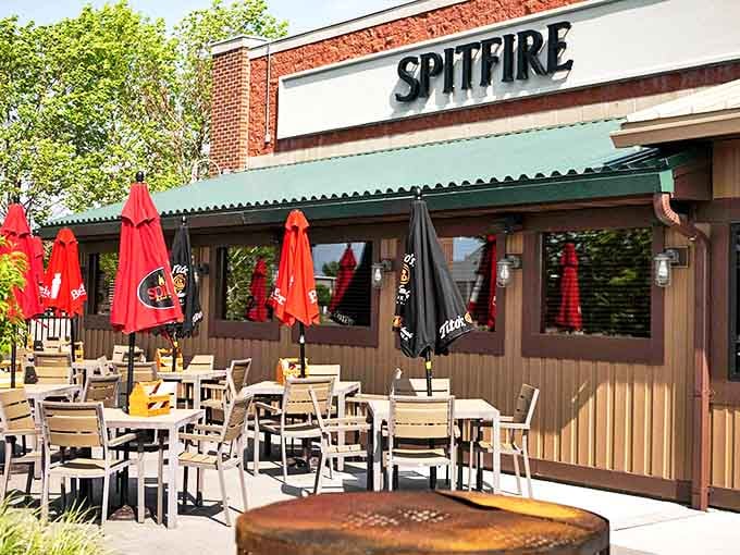 The outdoor patio offers al fresco dining where summer breezes complement the aromatic smoke wafting from within.