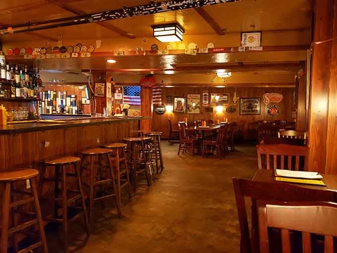 The bar area glows with warm lighting and promises of good times, like your favorite sitcom set come to life.