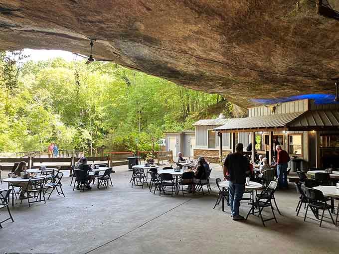 Dining under a natural rock canopy while surrounded by forest: nature's original dinner theater experience.