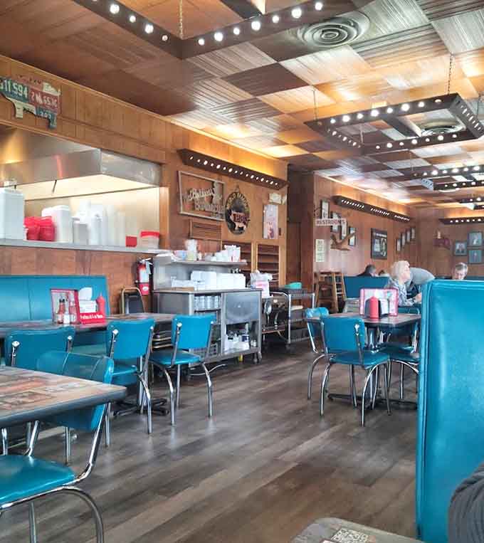 More of that glorious mid-century seating where countless barbecue pilgrimages have ended in satisfied sighs and loosened belts.