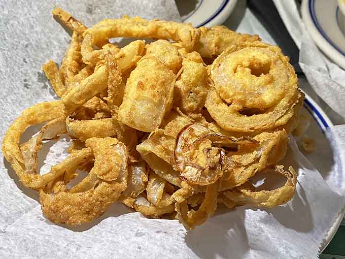 These onion rings are fried to golden perfection, crispy enough to hear from across the table.