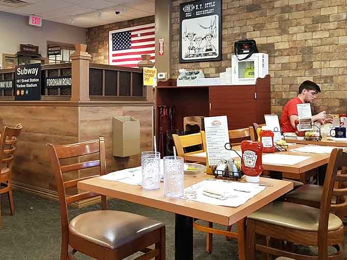 Classic deli atmosphere with comfortable seating, vintage subway signs, and that unmistakable buzz of a place doing everything right.