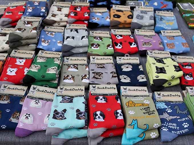 Colorful socks featuring every dog breed imaginable, because your feet deserve to celebrate man's best friend with style.