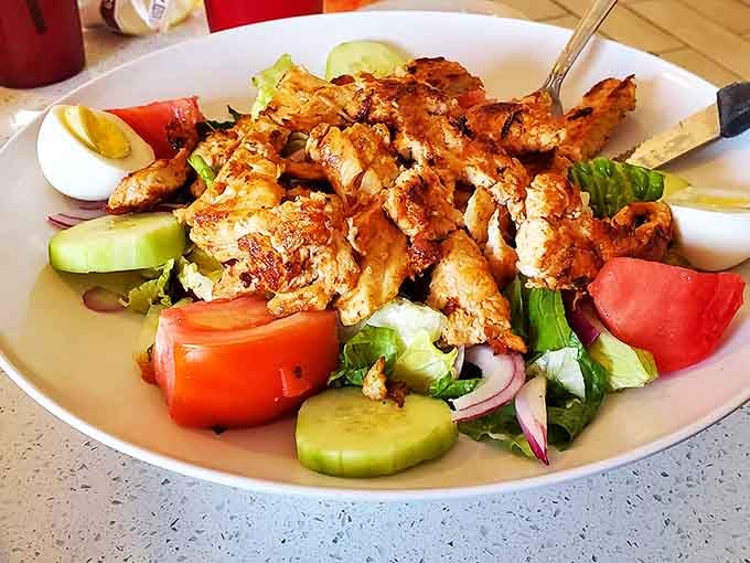 A grilled chicken salad that doesn't feel like punishment&mdash;fresh vegetables, perfectly seasoned protein, and enough color to make your Instagram followers jealous.