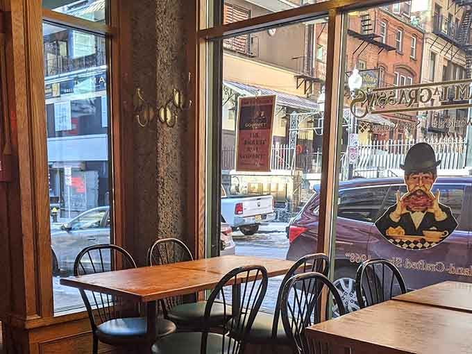 Window seats offer prime people-watching real estate while you tackle sandwiches that require strategic planning to eat.