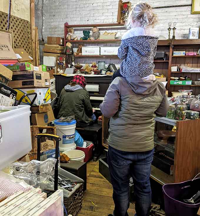 The thrill of the hunt! Shoppers dig through promising piles, each hoping to unearth that perfect something they didn't know they needed.
