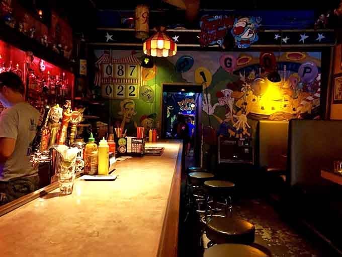 The bar glows with possibility, where cold beer meets vintage games in a marriage of simple pleasures done right.