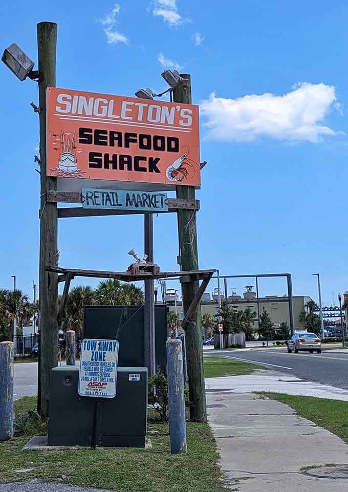 That roadside sign is your beacon to some of Jacksonville's best-kept seafood secrets waiting inside.