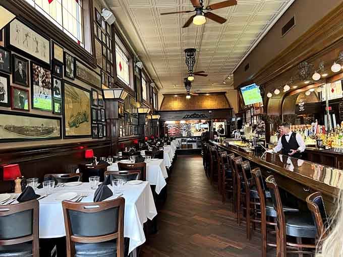 Crisp white linens and classic steakhouse ambiance set the stage for meals that become cherished memories almost immediately.