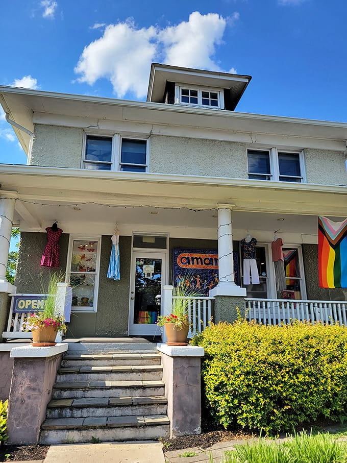 Colorful storefronts in converted houses perfectly capture the town's residential-meets-commercial vibe that actually works.