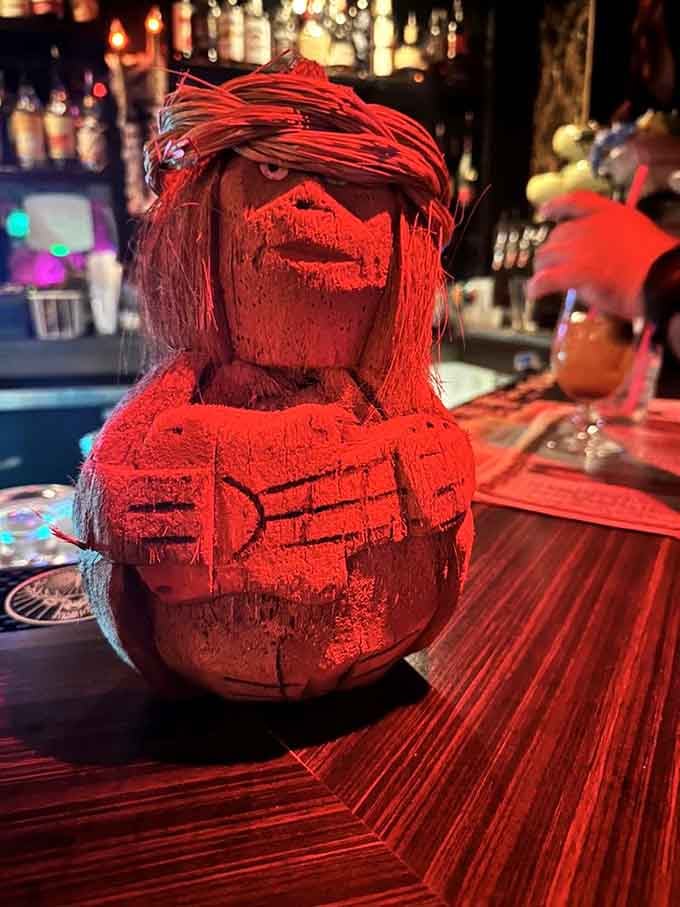 This carved coconut mug is staring into your soul, judging your drink choices, and approving wholeheartedly.