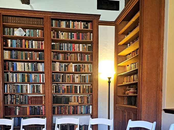 Floor-to-ceiling bookshelves suggest someone here takes their castle library very seriously indeed.