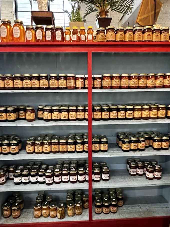 Rows of homemade preserves stand at attention like delicious soldiers ready to enhance your breakfast table immediately.