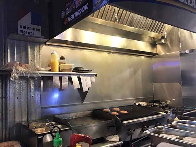 An open kitchen means nothing to hide, just honest cooking happening right before your hungry eyes.