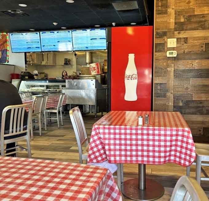 More cozy seating options with those iconic checkered tablecloths, because everyone deserves a comfortable spot for their feast.