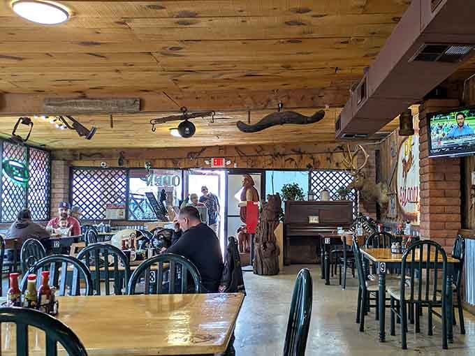 Wooden tables and chairs create a casual dining room where families laugh together over menu items they can't say out loud.