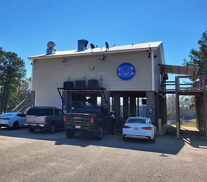 The Sandbar proves that great local hangouts don't need fancy facades&mdash;just good food, cold drinks, and a parking lot full of regulars who know they've found home.