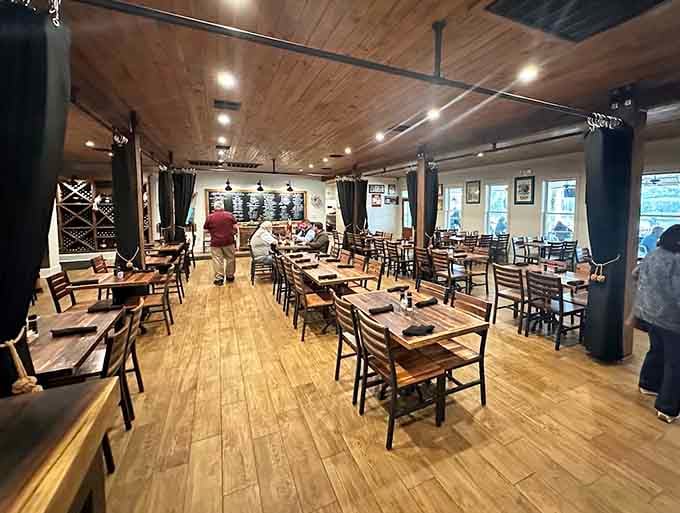 The evening glow transforms this humble building into a beacon for anyone who appreciates honest, delicious food.