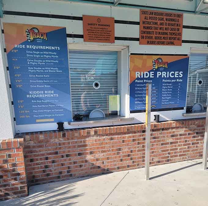 The ticket booth where vacation budgets meet reality, and somehow reality always loses in the best possible way.