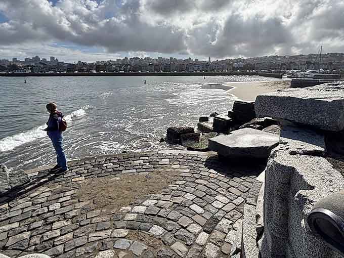 One visitor stands mesmerized by the view, experiencing that rare San Francisco moment of complete tranquility.