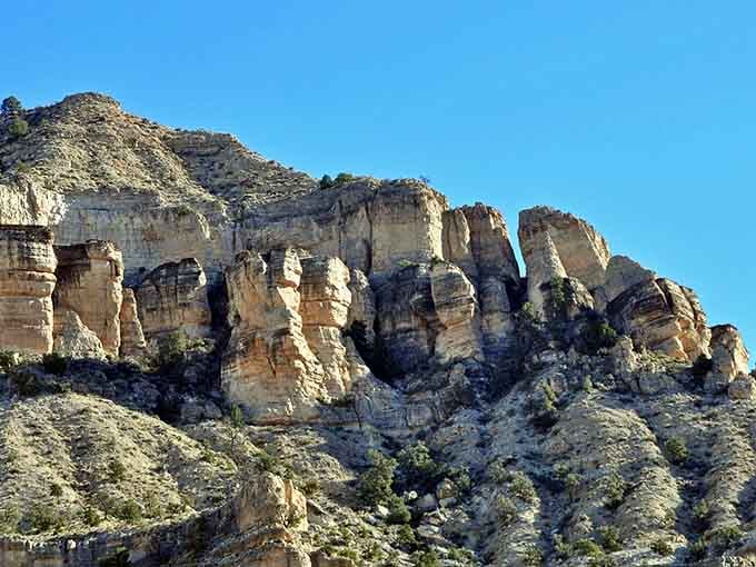 These cliff faces reveal the earth's biography, each layer a chapter in a story spanning geological epochs.