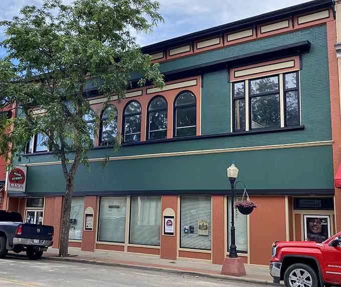 This colorful building adds architectural personality to Main Street like a character actor stealing scenes in a classic film.
