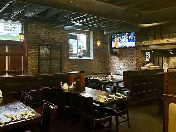 Booth seating with views of screens means nobody misses the game while enjoying their meal.