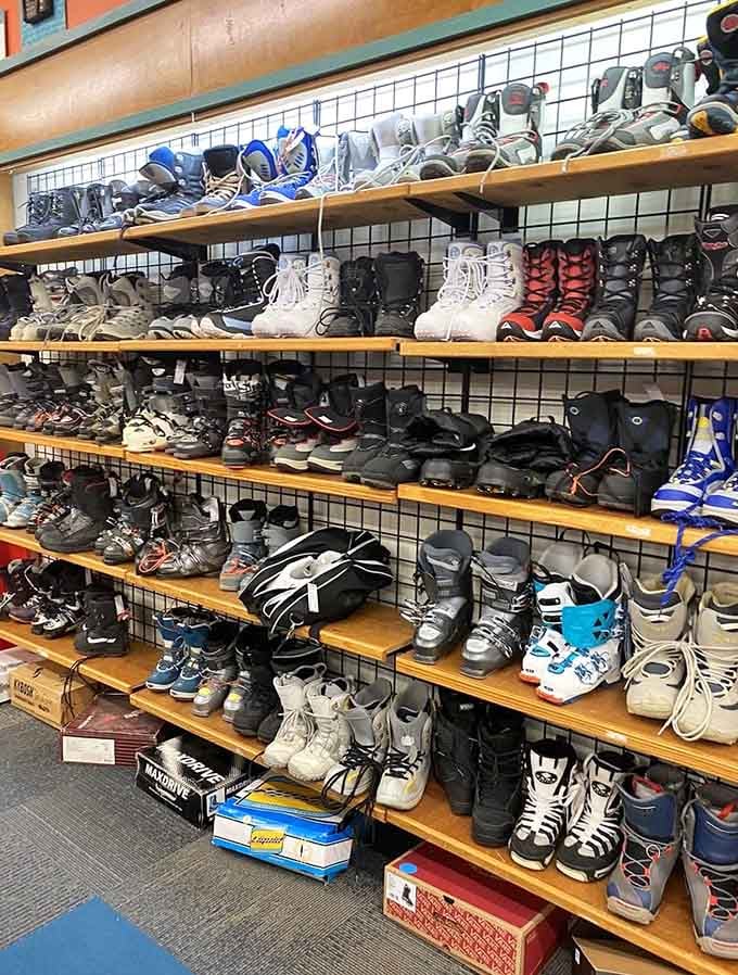 Ski boots and ice skates waiting for winter adventures, because apparently people pack optimistically and forget enthusiastically.