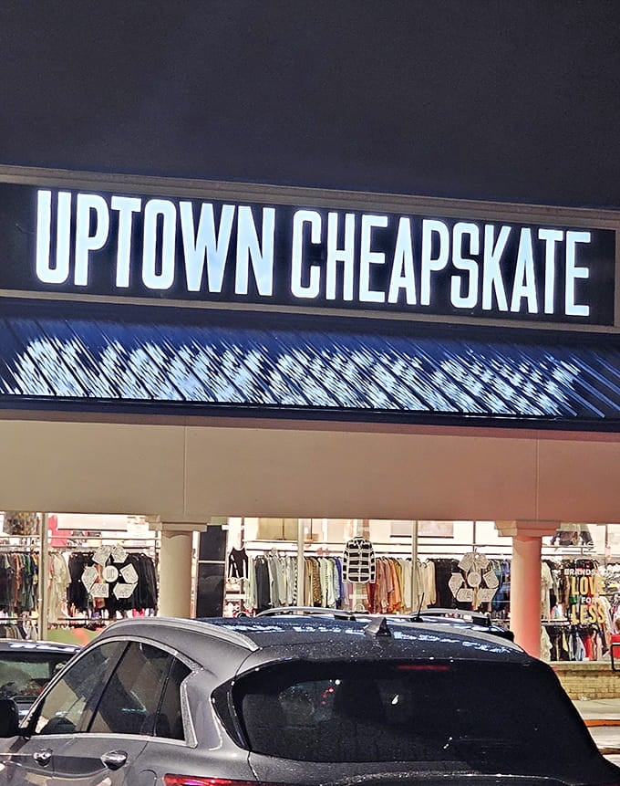 The sign glows like a promise that your bank account will actually survive this particular shopping expedition unscathed.