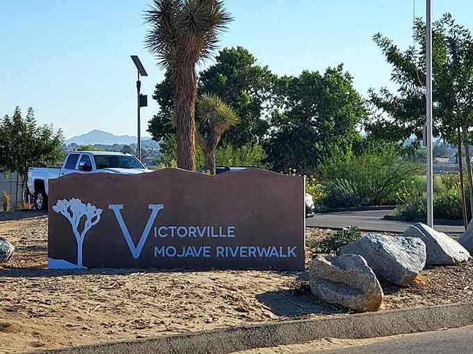 The Mojave Riverwalk sign marks one of Victorville's natural treasures, where desert landscaping meets recreational opportunity in perfect harmony.