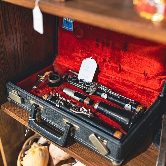 This vintage clarinet rests in its velvet case like Sleeping Beauty, waiting for the right musician to awaken its dormant melodies.
