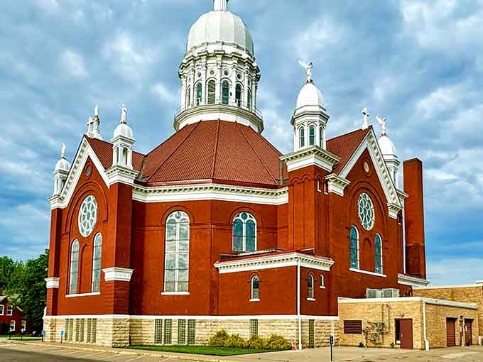 St. Stanislaus Basilica's copper dome catches sunlight like a beacon, announcing faith and architectural ambition from blocks away.