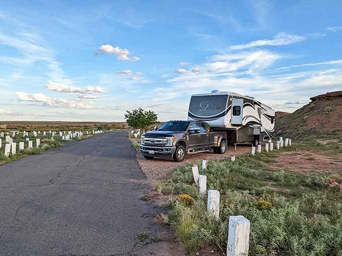 This vintage camper parked along the old highway alignment captures the romantic spirit of American road trips from a simpler era.