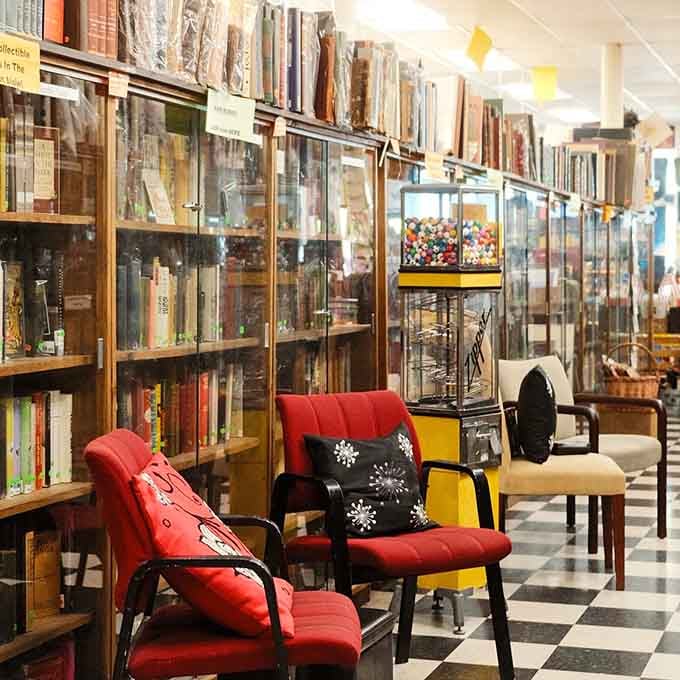 Rare editions and collectibles rest safely in glass cases, the crown jewels of this literary kingdom.