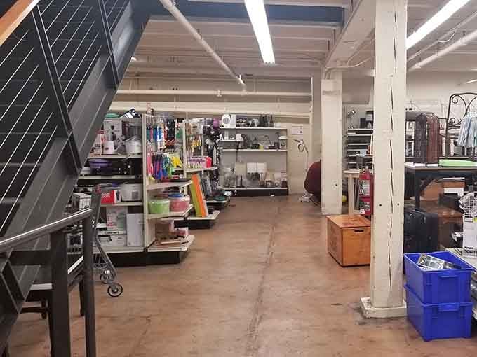 The lower level sprawls with furniture and larger items, each piece waiting for someone to see its potential.