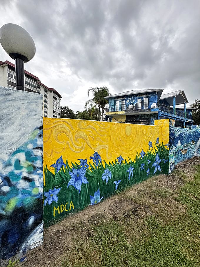 A yellow wall adorned with blue irises pays homage to another Van Gogh classic. The "MDCA" signature hints at Mount Dora's proud artistic community.