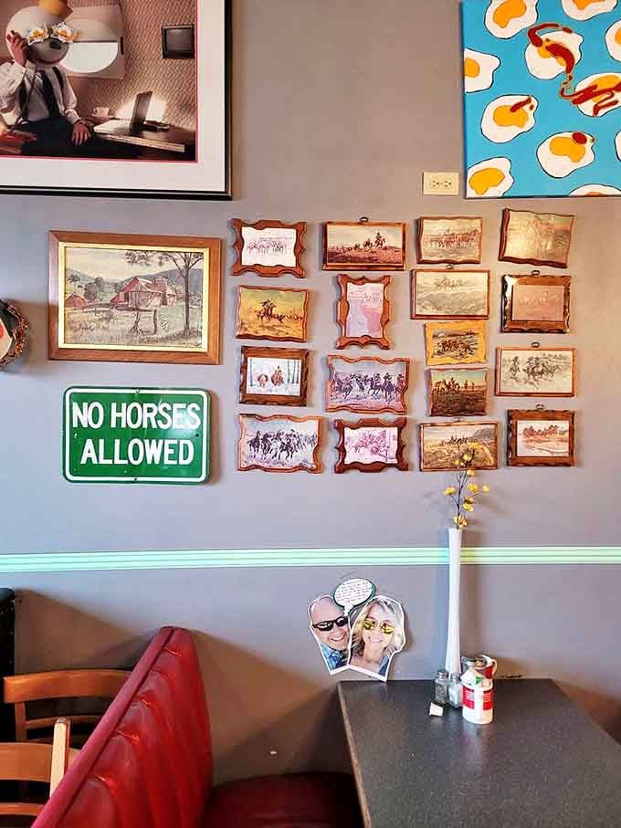 A gallery wall of western art and a cheeky "No Horses Allowed" sign &ndash; Idaho humor served alongside your eggs.